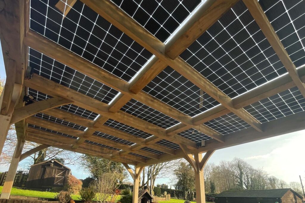 Large Elegant Oak Mono Crystalline Solar carport | NewFrame | Solar ...
