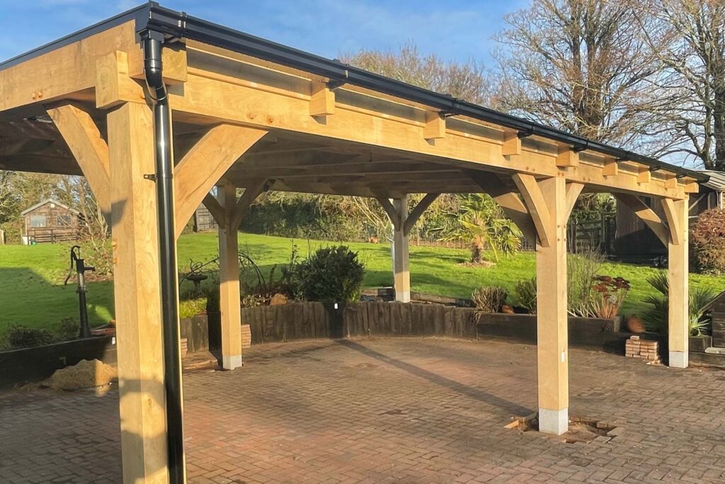 Large Elegant Oak Mono Crystalline Solar carport | NewFrame | Solar ...